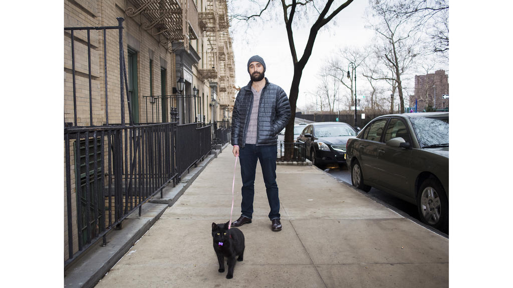 See adorable photos of New York men with their cats