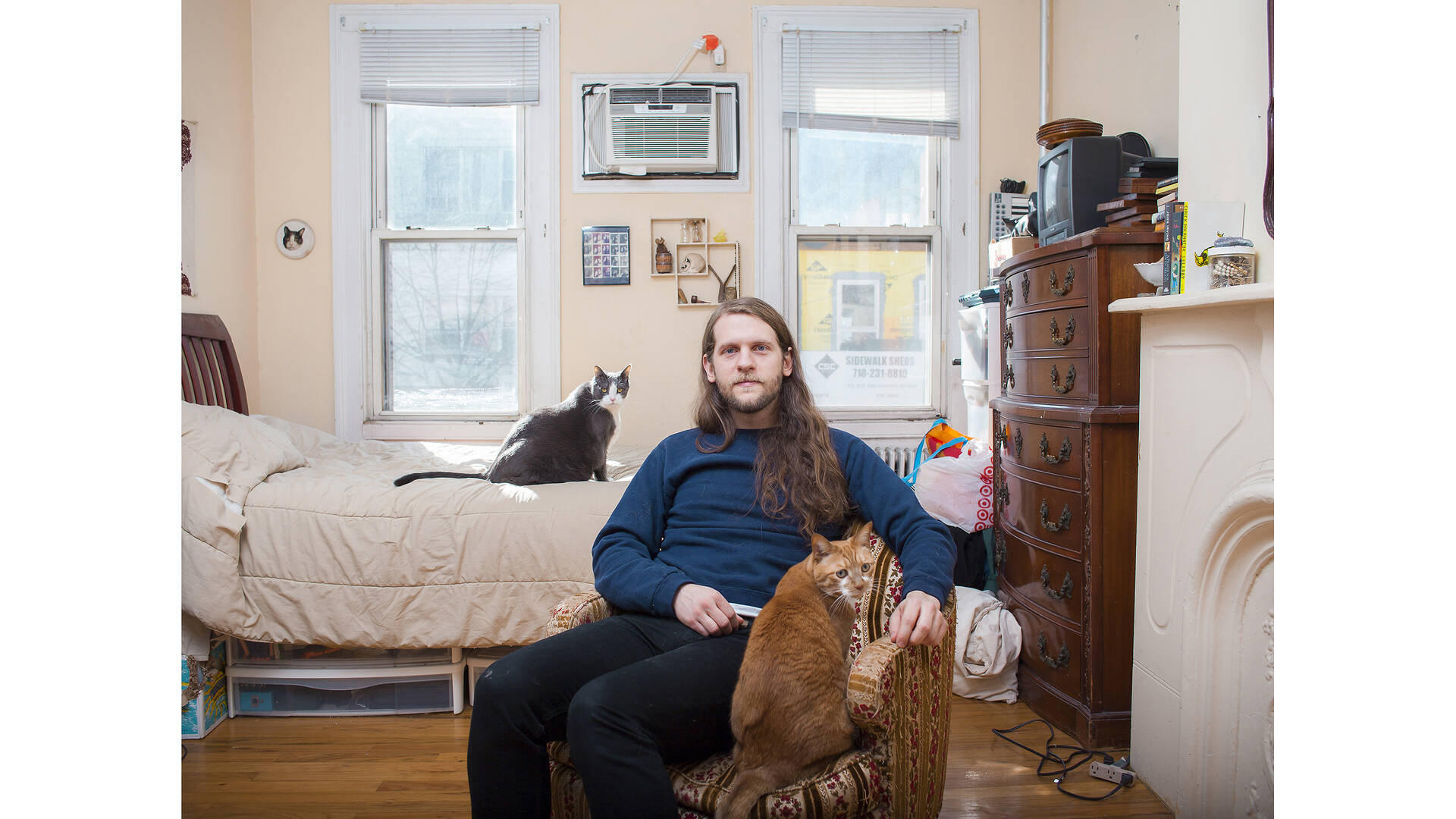 See adorable photos of New York men with their cats