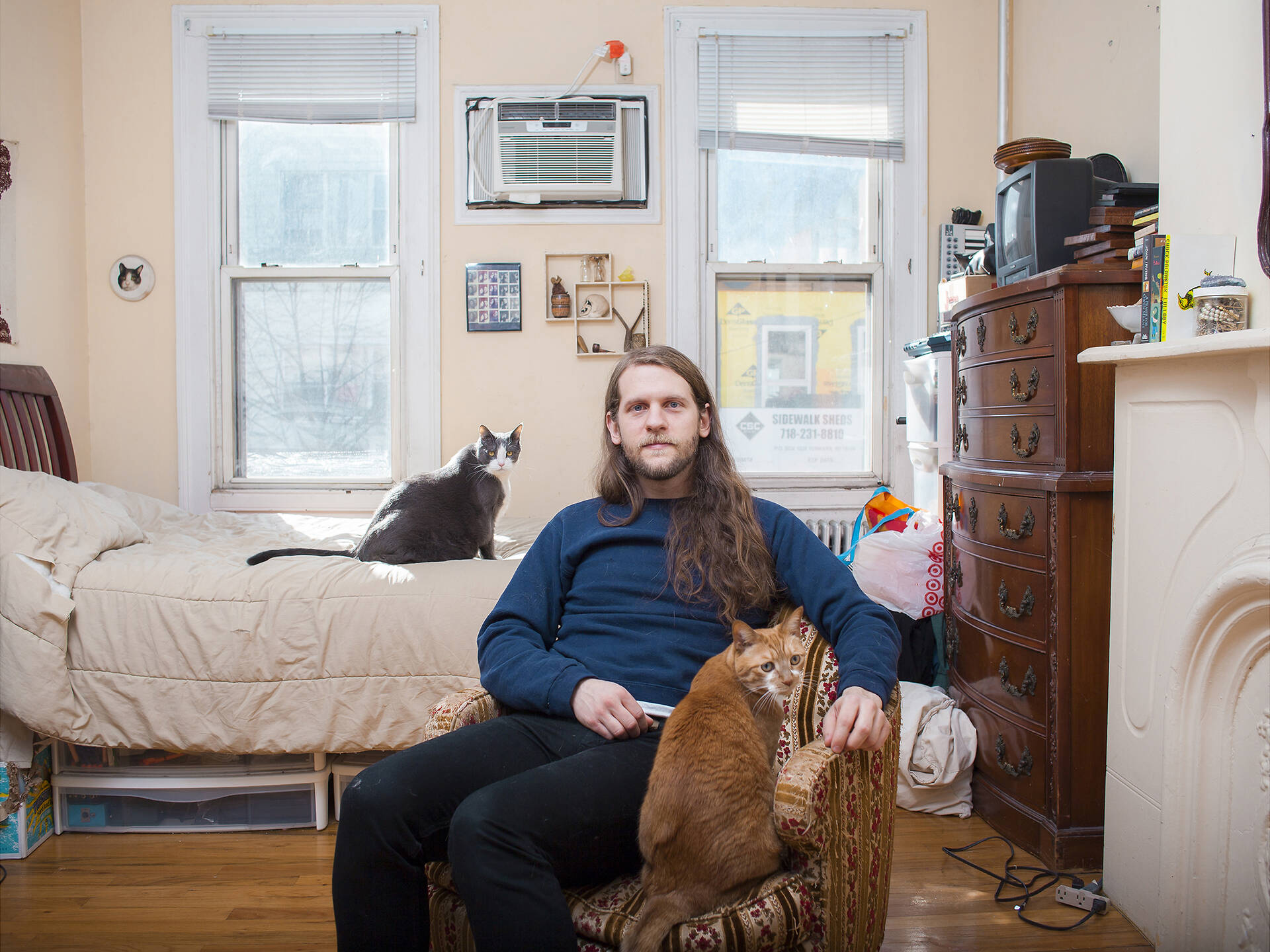 See adorable photos of New York men with their cats