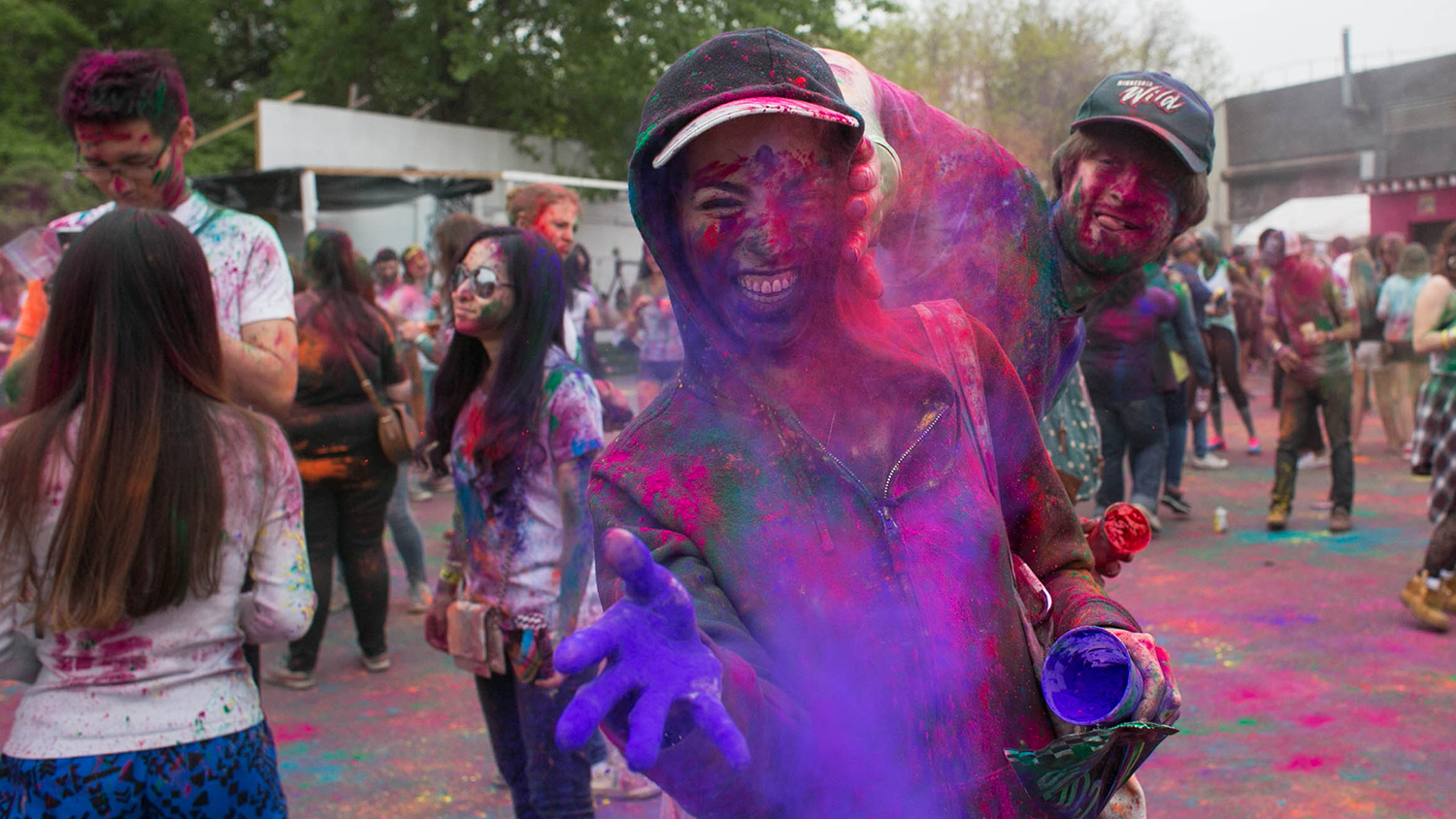 Check out the multi-colored fun at this year's Festival of Colors Holi ...