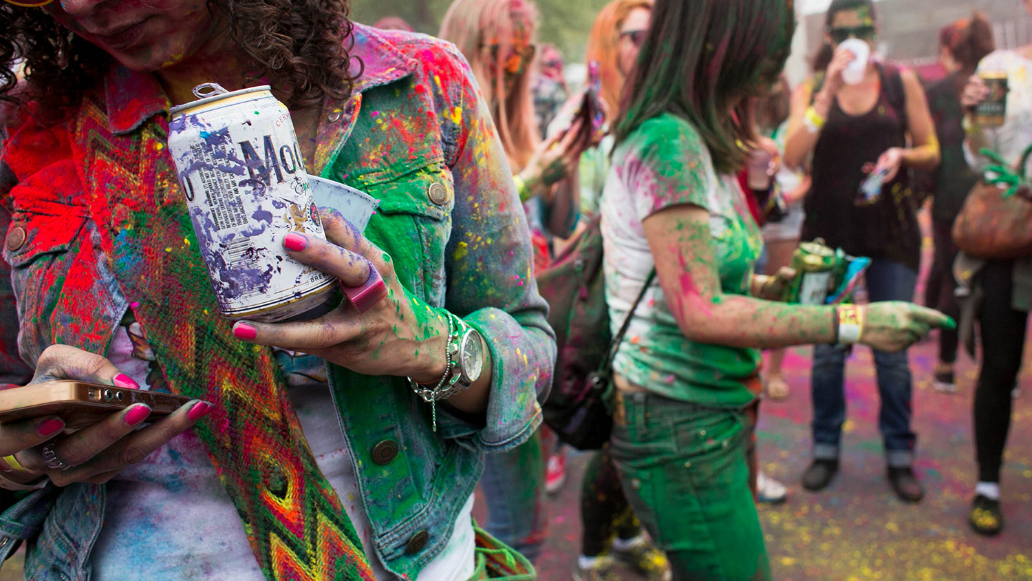 Check out the multi-colored fun at this year's Festival of Colors Holi ...