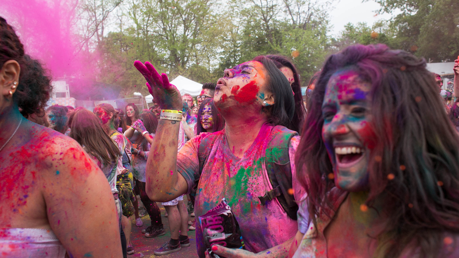 Check out the multi-colored fun at this year's Festival of Colors Holi ...