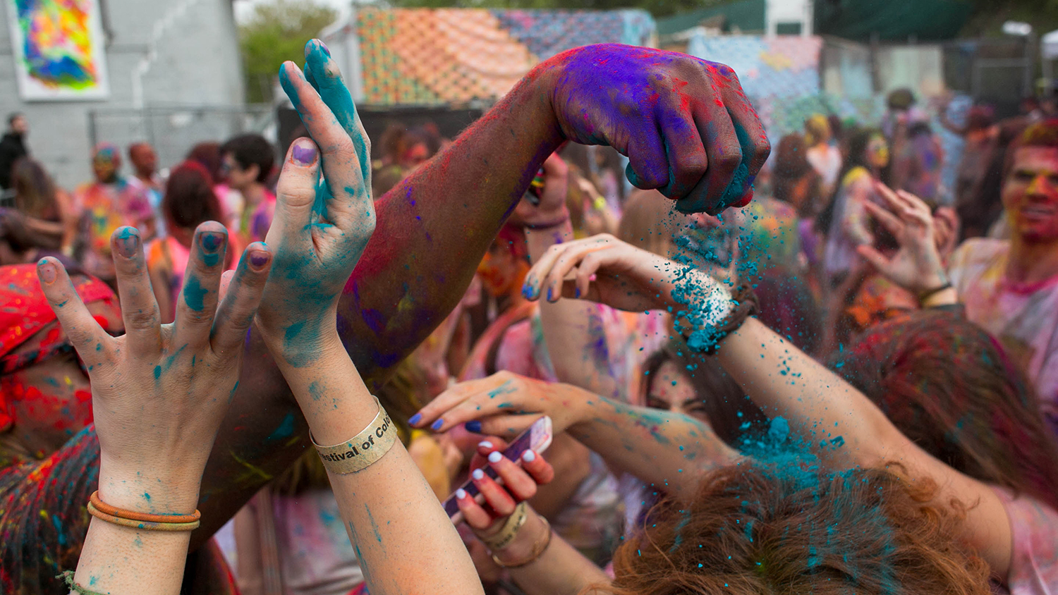 Check out the multi-colored fun at this year's Festival of Colors Holi ...