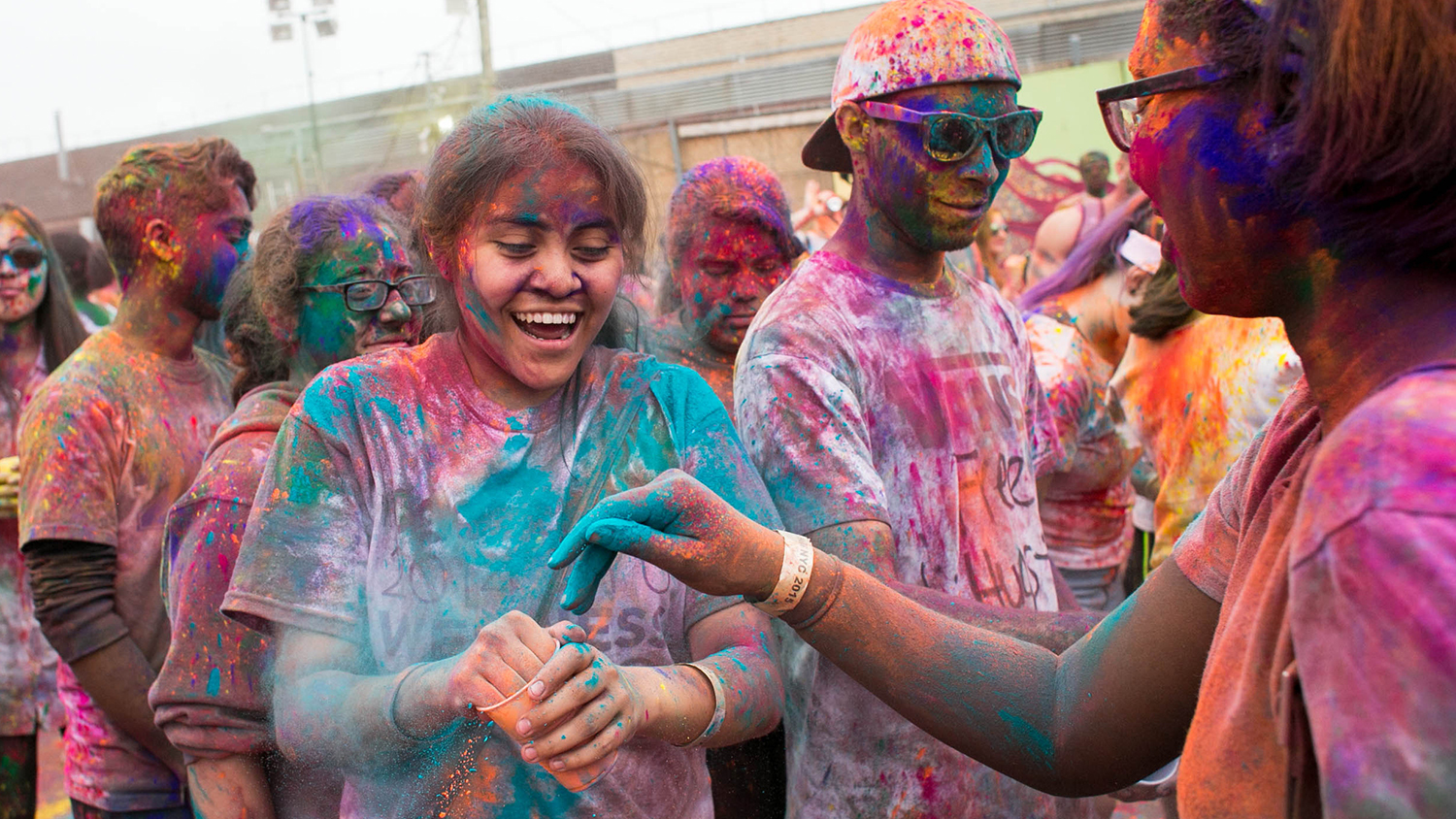 Check out the multi-colored fun at this year's Festival of Colors Holi ...