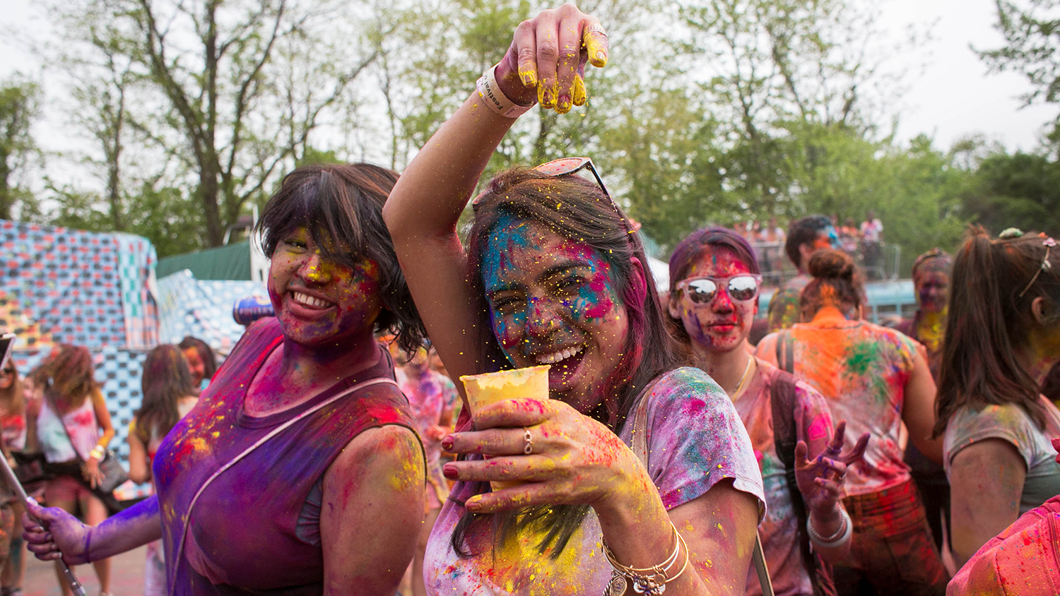 Check out the multi-colored fun at this year's Festival of Colors Holi ...