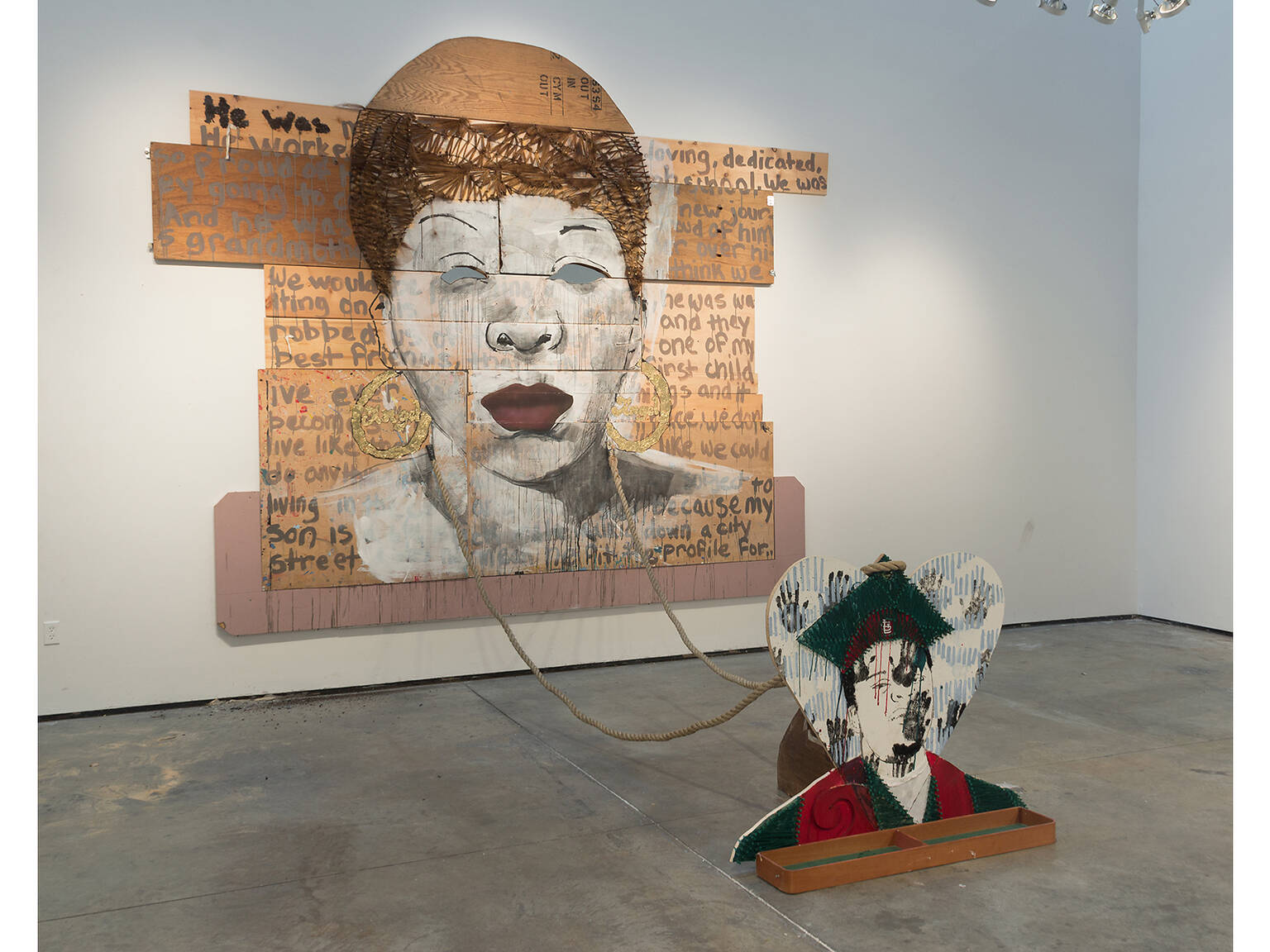 See photos of painter Aaron Fowler's reflective mixed-media works