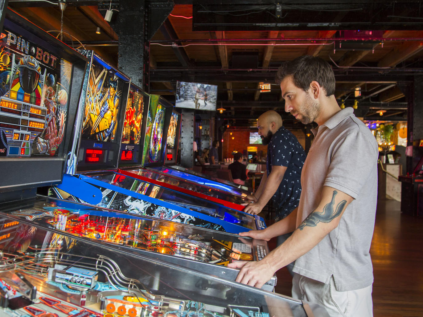 13 Best Arcade Bars in Chicago to Drink Beer and Play Games