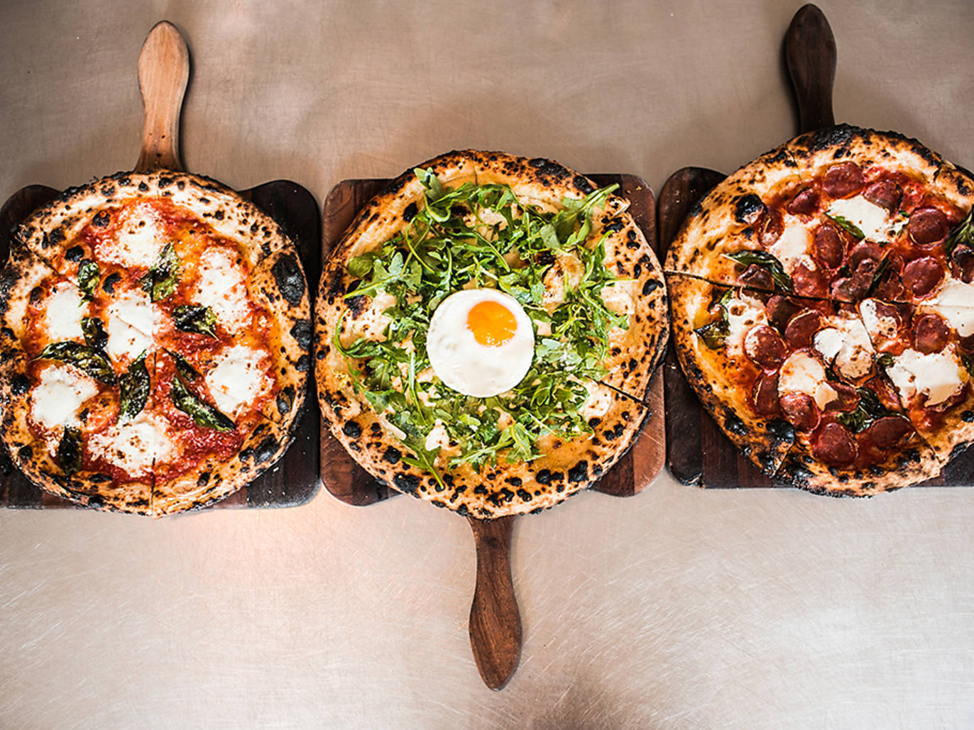 Best Austin pizza restaurants for cheesy pies and top delivery