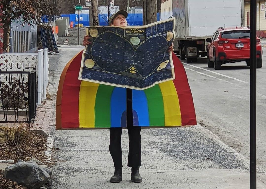 Watch a human rainbow explore the empty city street of Montreal