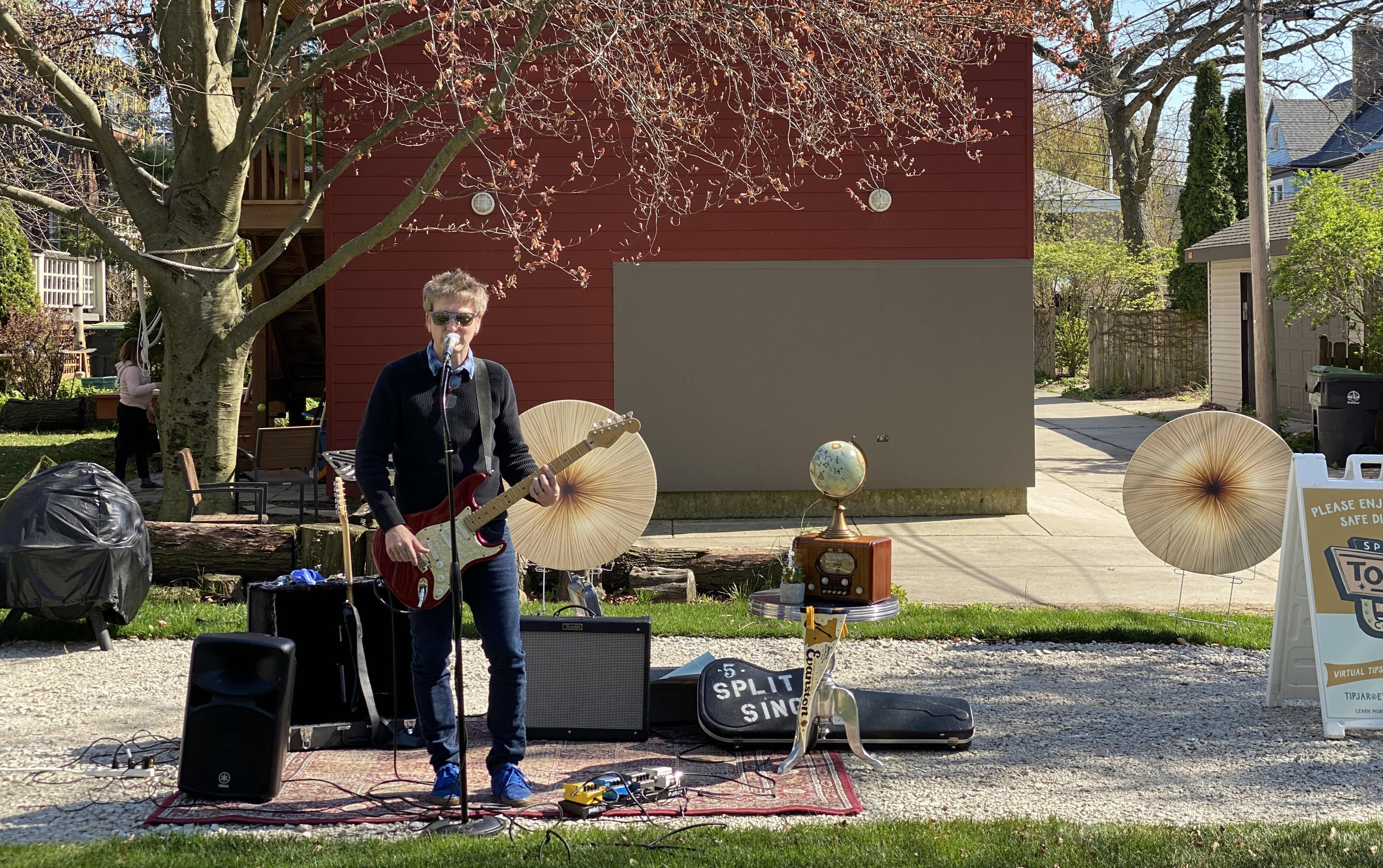 You can book a local musician to perform in your yard this summer
