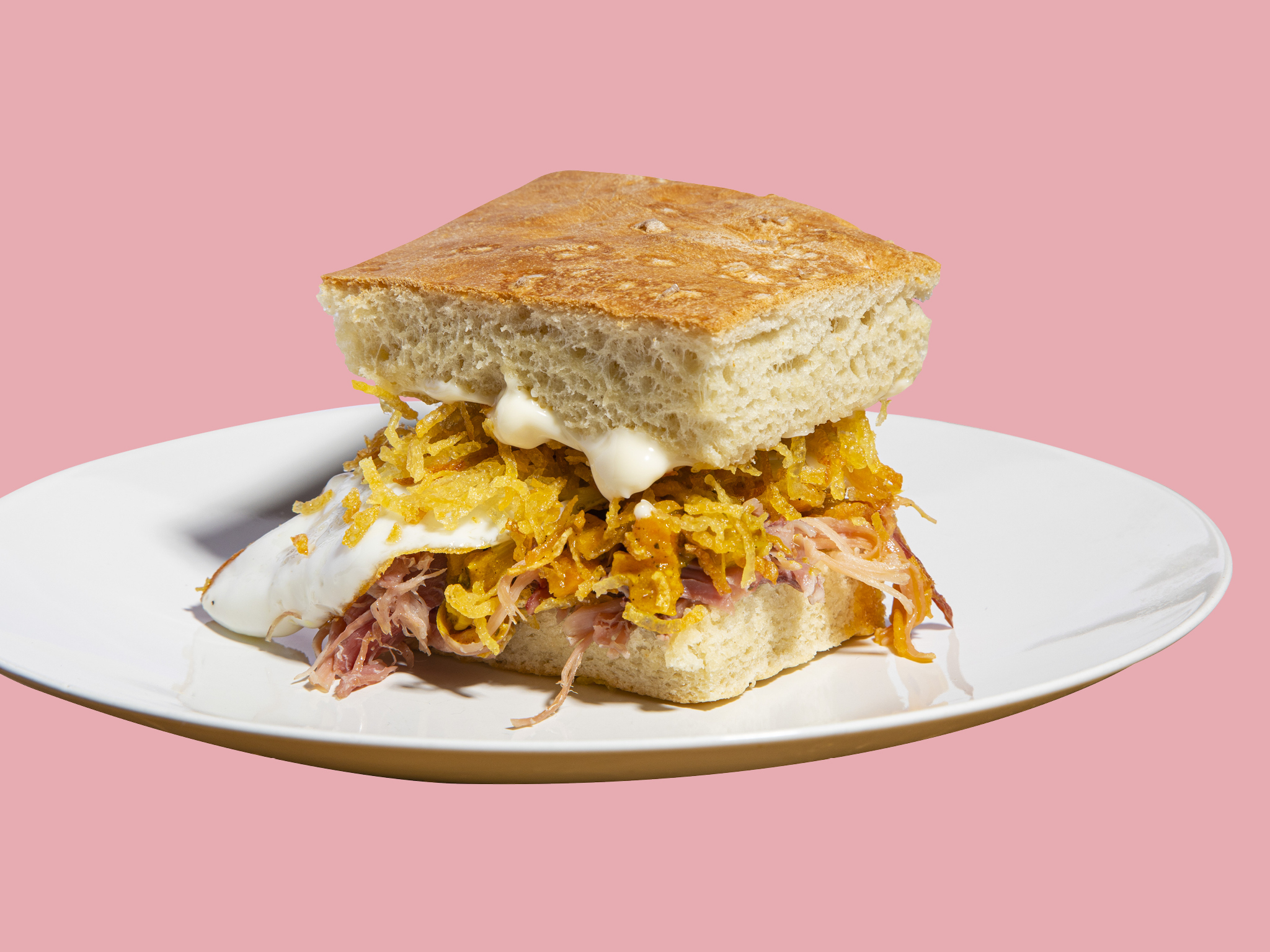 What goes into ham, egg ’n’ chips at Max’s Sandwich Shop