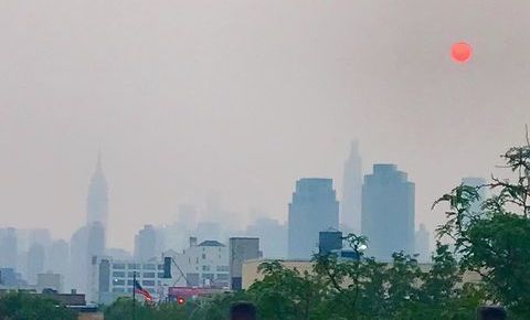 13 eerie photos of yesterday’s ominous red sun over NYC