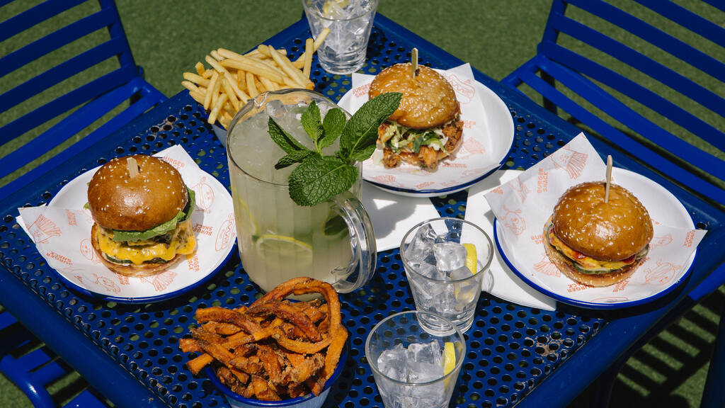 Visit Rooftop Bar on the uppermost level of Curtin House