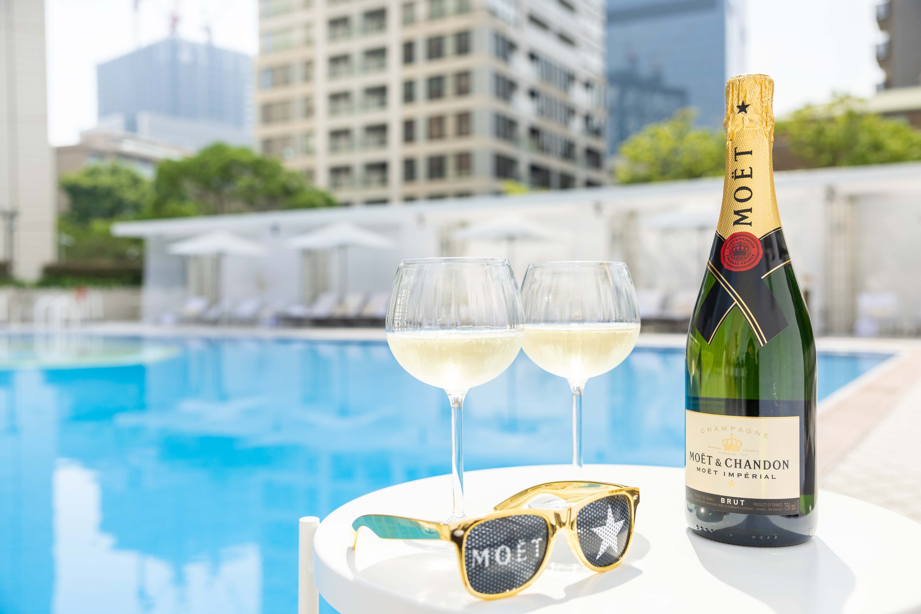 Summer Beach Club with Moët & Chandon by the skyline