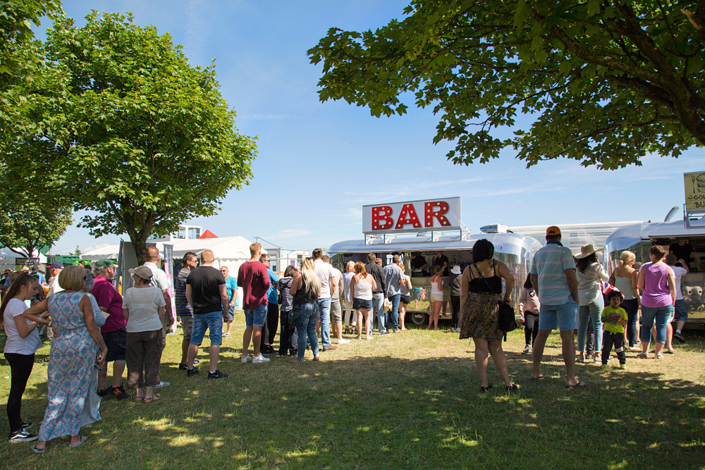 Why Have People Started Queuing Single-File in Pubs?