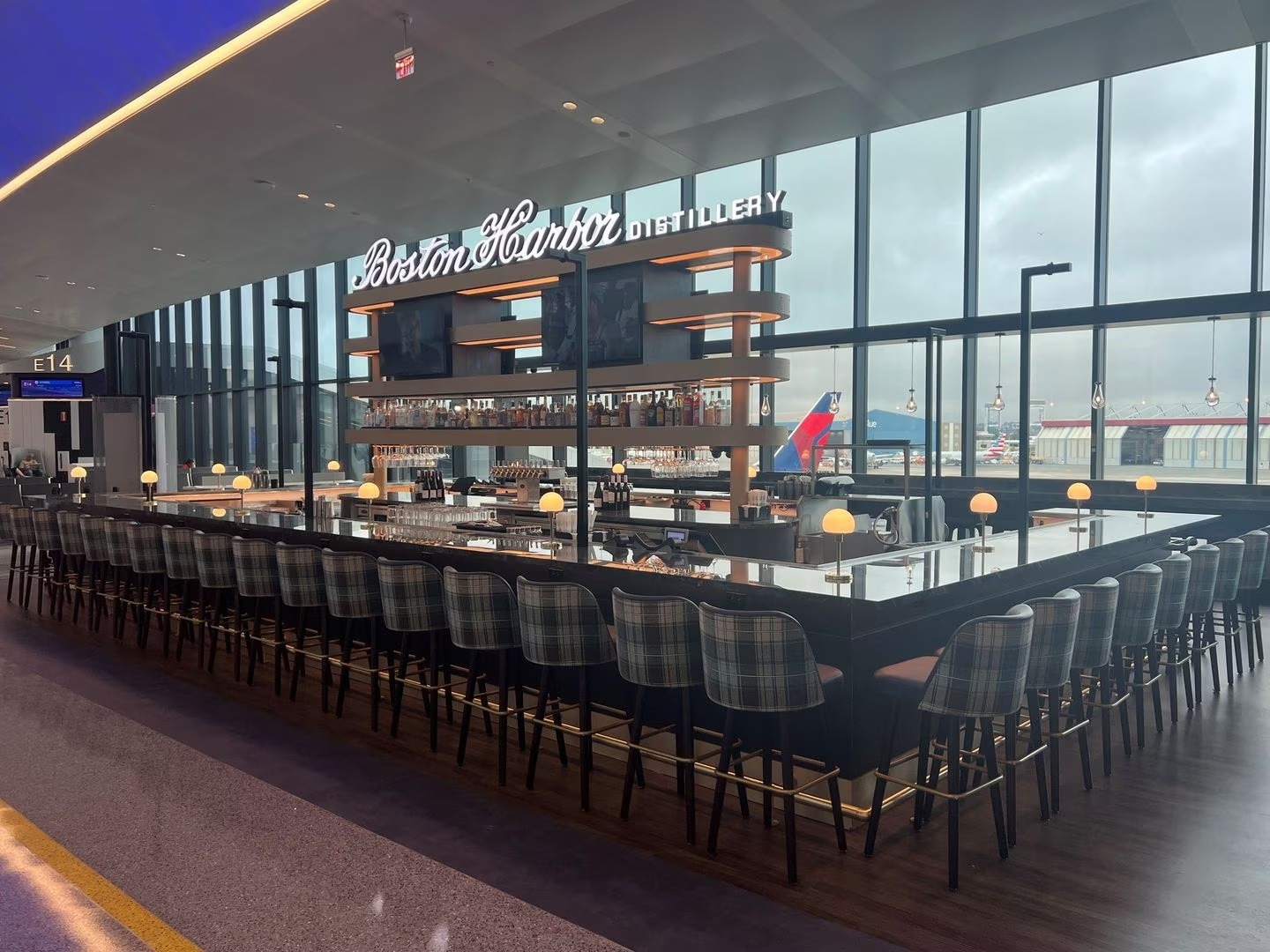 Boston Harbor Distillery opened a new bar at Boston Logan Airport