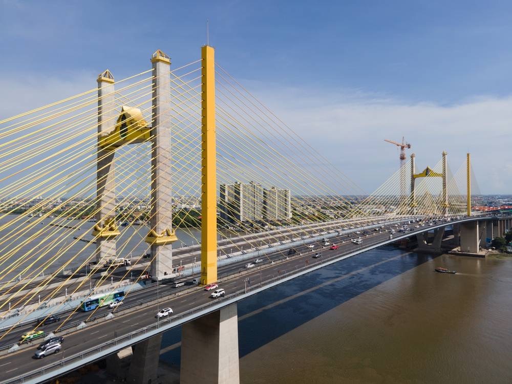 Take your sweet time walking along this new bridge over the Chao Phraya ...