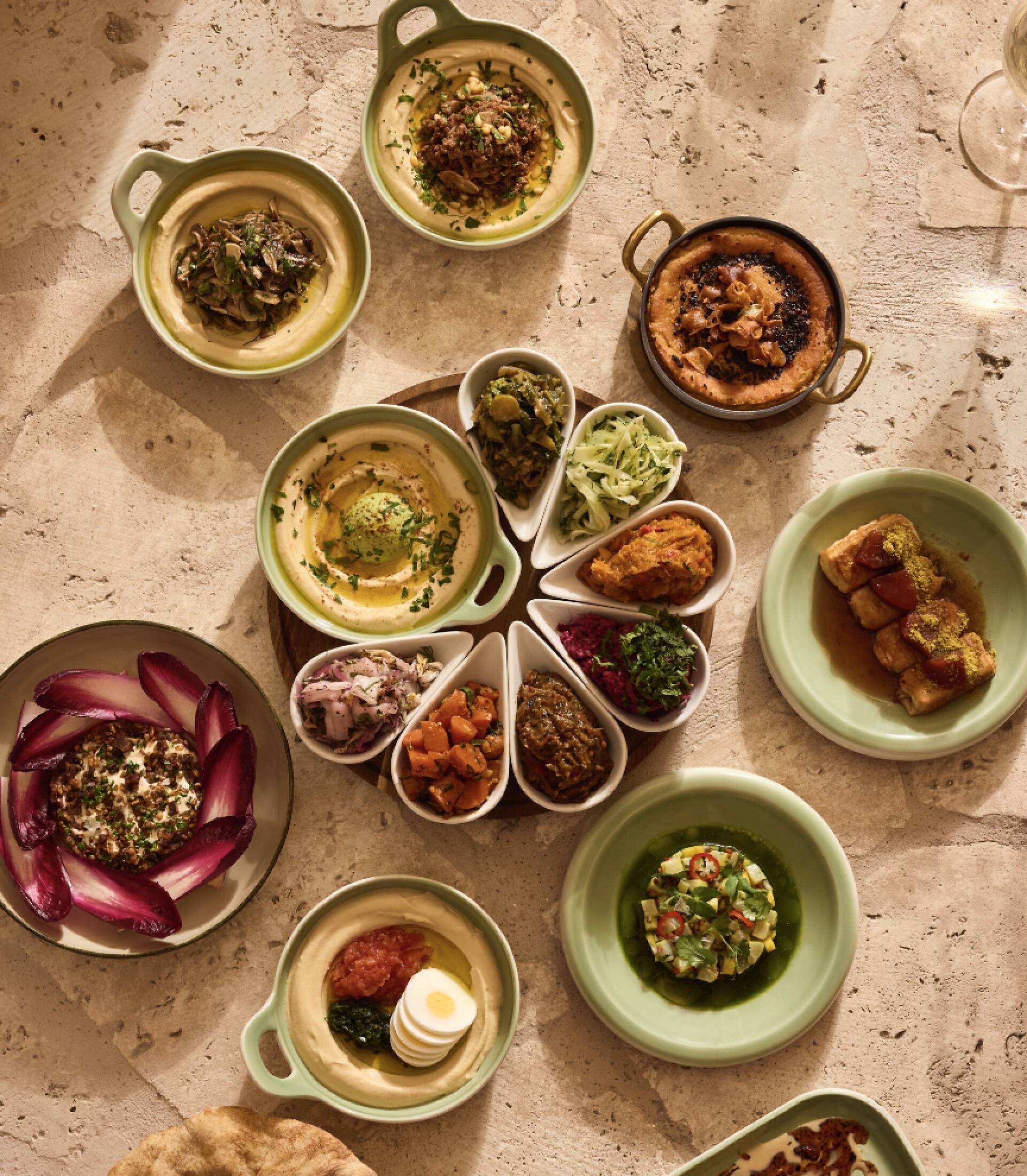 When is Michael Solomonov's new restaurant Aviv opening in Miami?