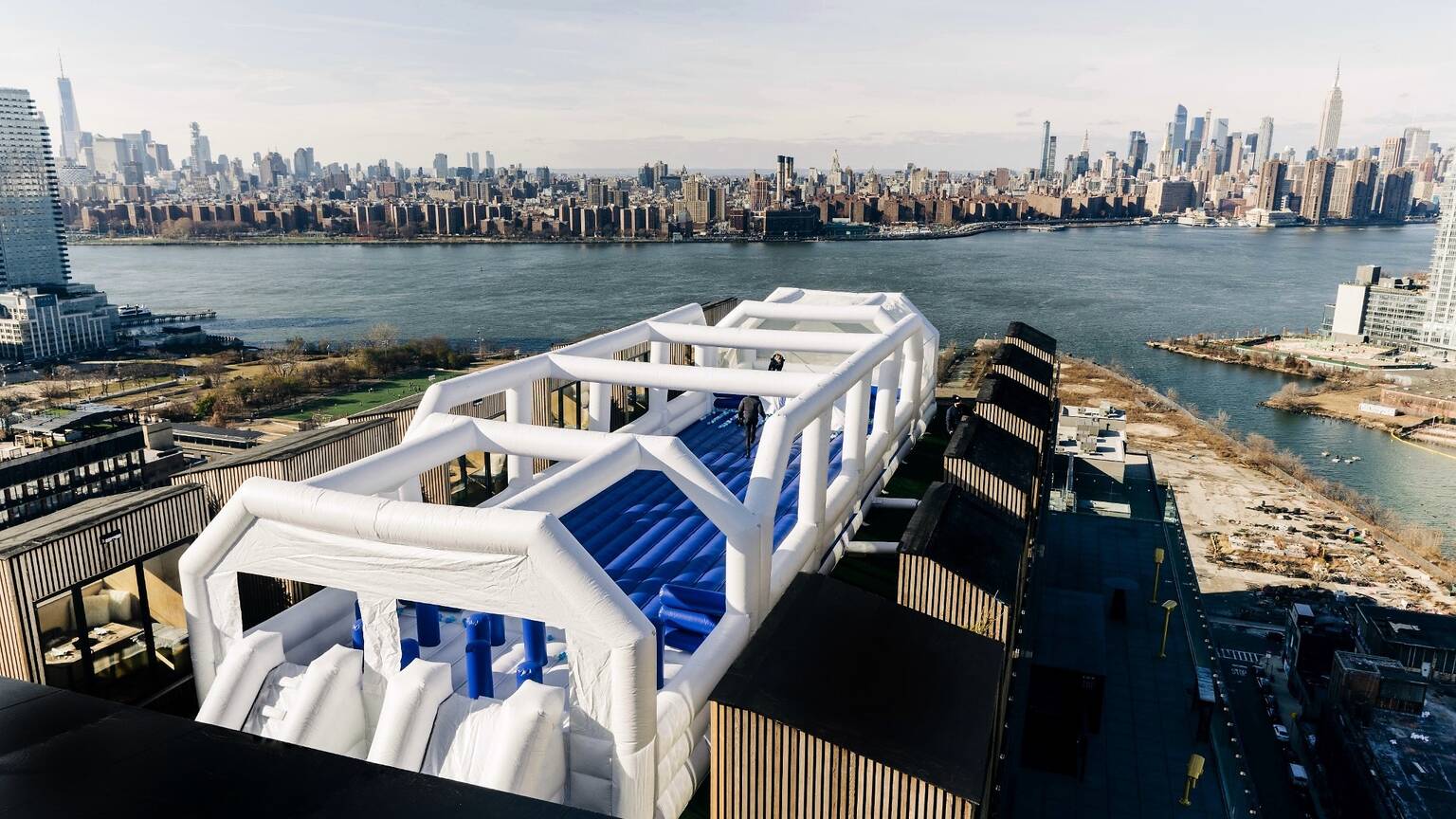 There's a giant rooftop bouncy castle overlooking the NYC skyline in ...