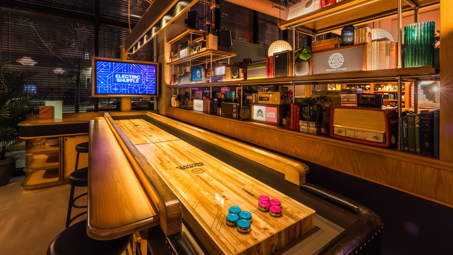 Neon-lit shuffleboard bar Electric Shuffle debuts in Chicago: see inside