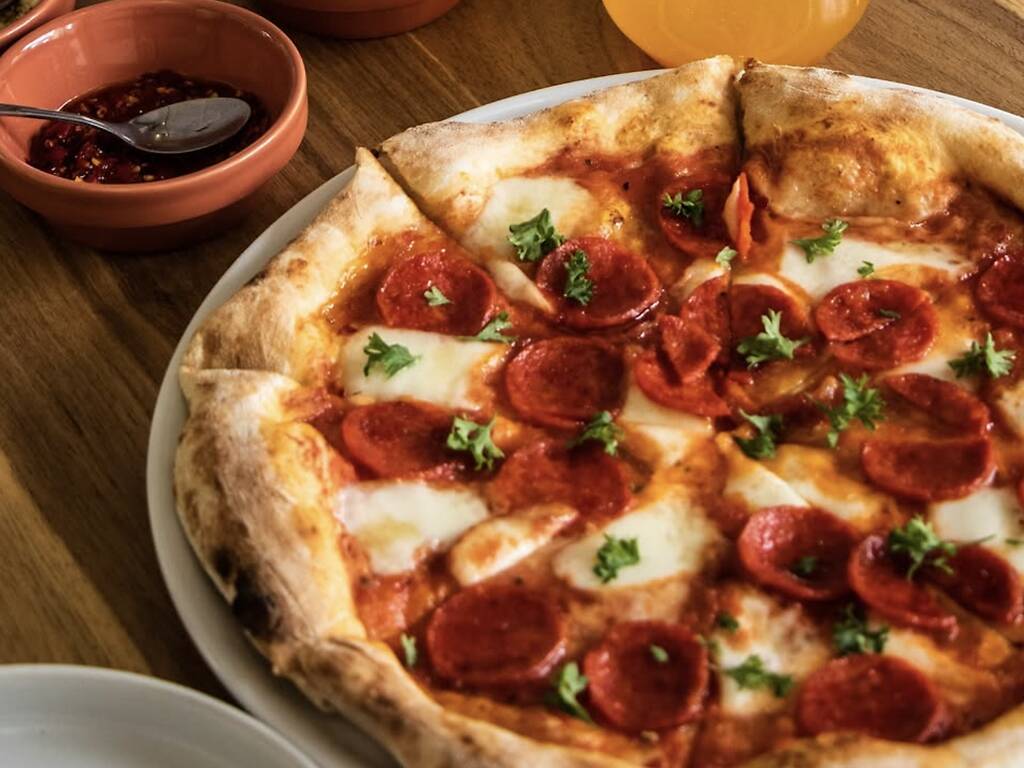 18 Best Pizzas In The World For 2026, According to Local Writers Who’ve ...